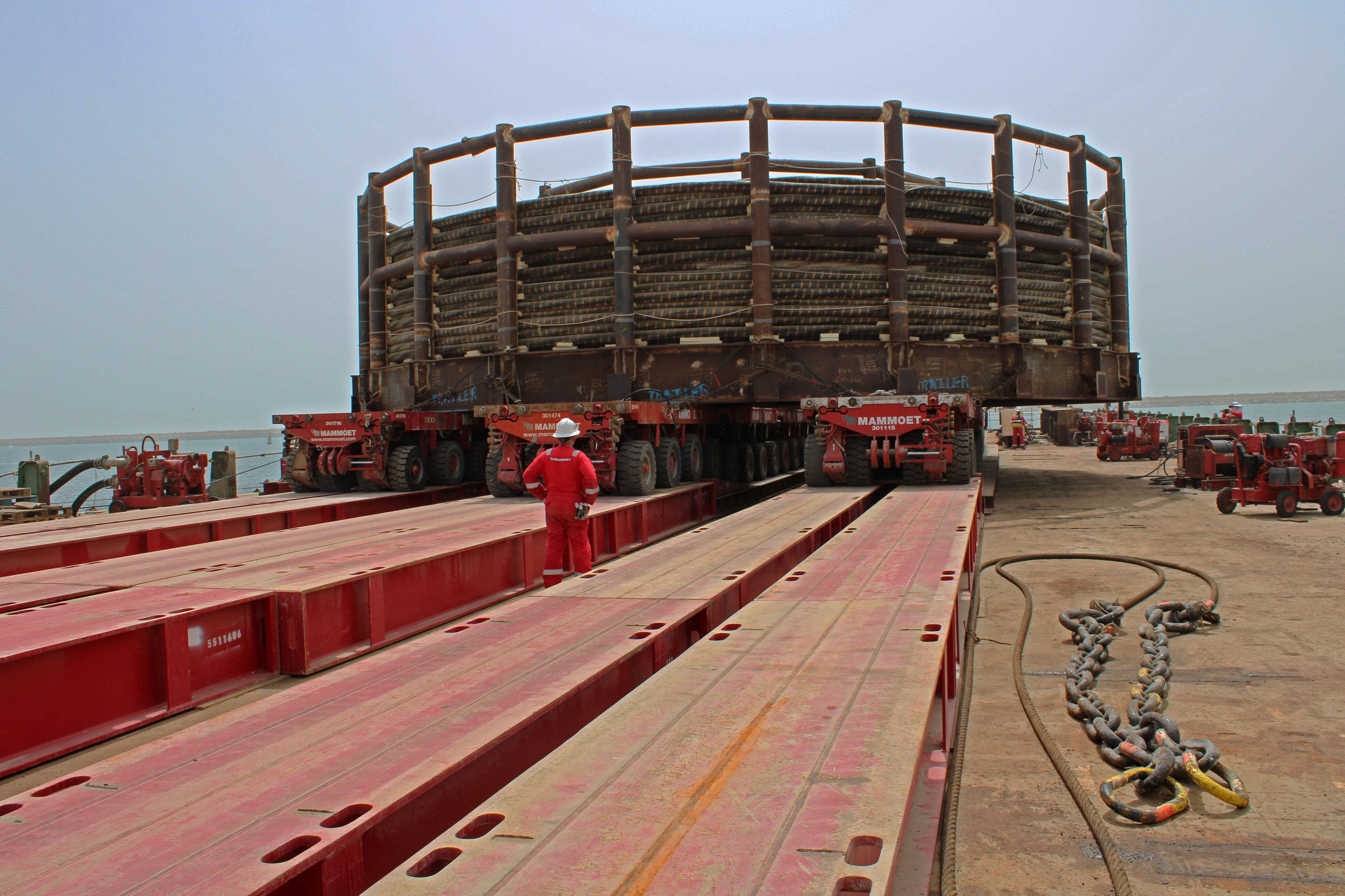 Efficient load-in and transpooling of subsea cable for an offshore ...