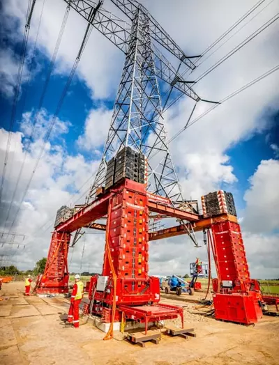 Elevation of an active high voltage power pylon | Mammoet news