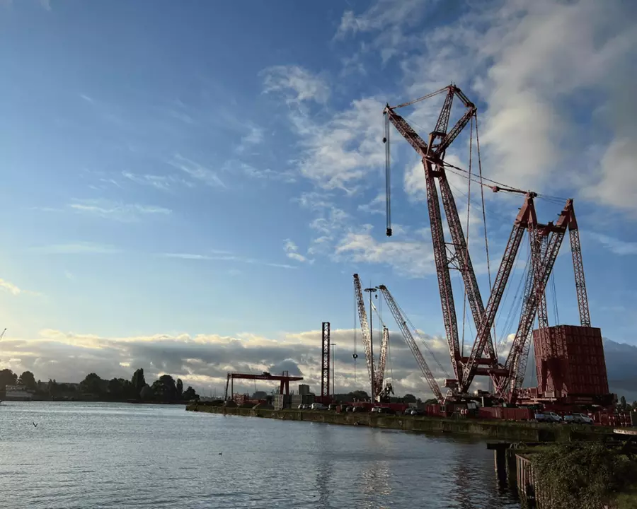Rotterdam skyline greets one of the world’s largest cranes for offshore ...