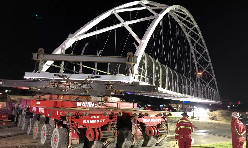 One-of-a-kind bridge links pedestrian trails over busy Texas highway